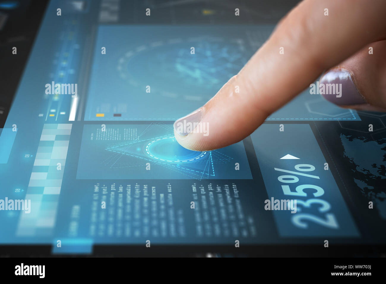 finger on touch screen with virtual data Stock Photo - Alamy