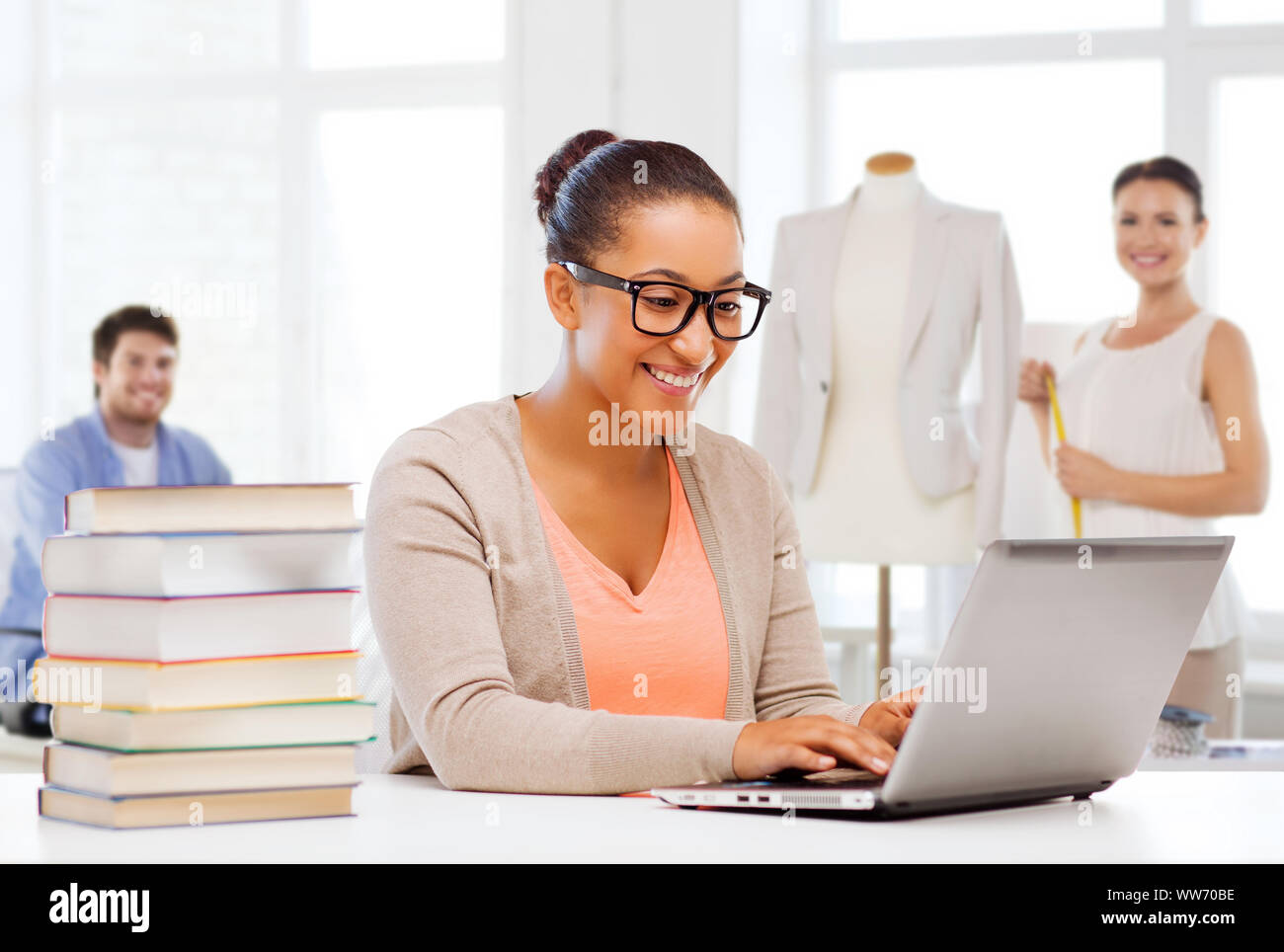 female student with laptop computer and books Stock Photo - Alamy