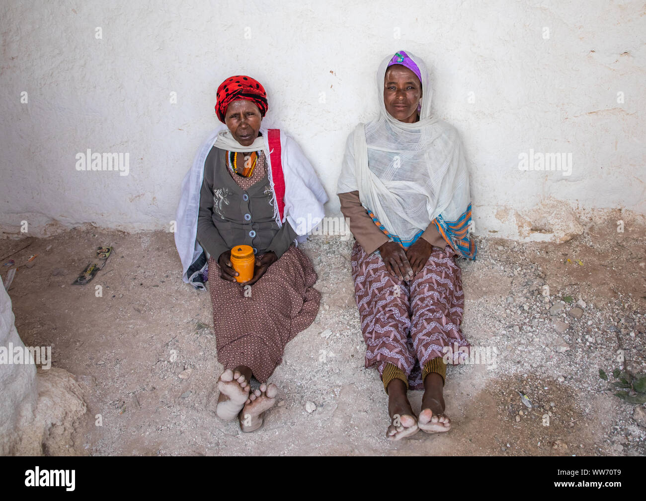 Oromo pilgrims in Sheikh Hussein shrine with jarawa powder on the face ...