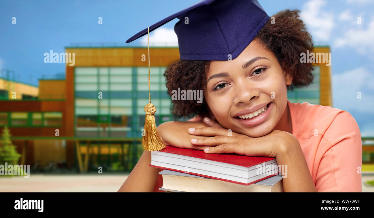 african american graduate student with books Stock Photo - Alamy
