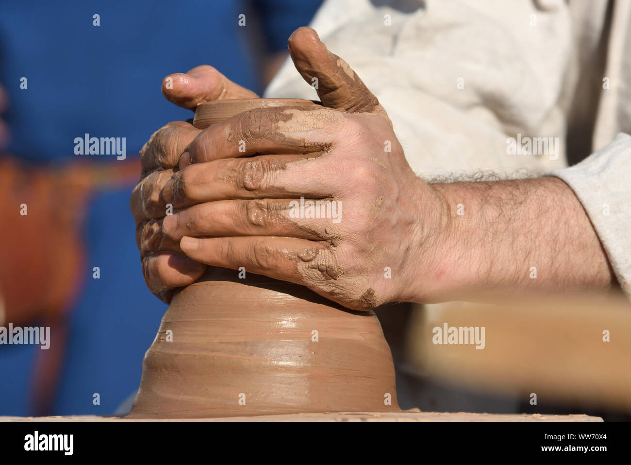 Pottery male ceramist creates a hand made clay product. Process of ...