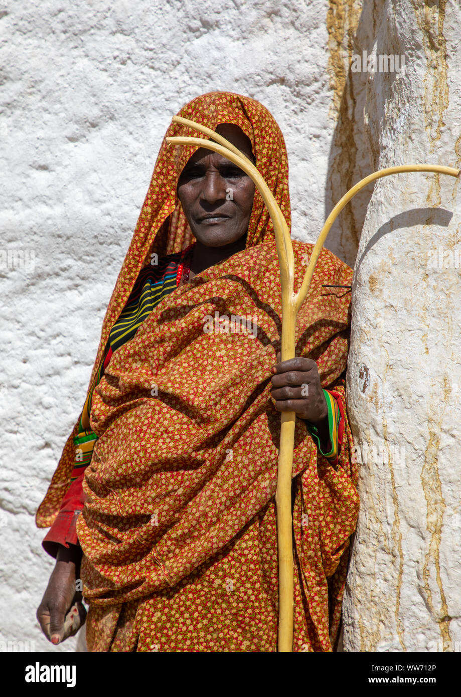 Oromo pilgrim woman in Sheikh Hussein shrine with the forked stick of ...