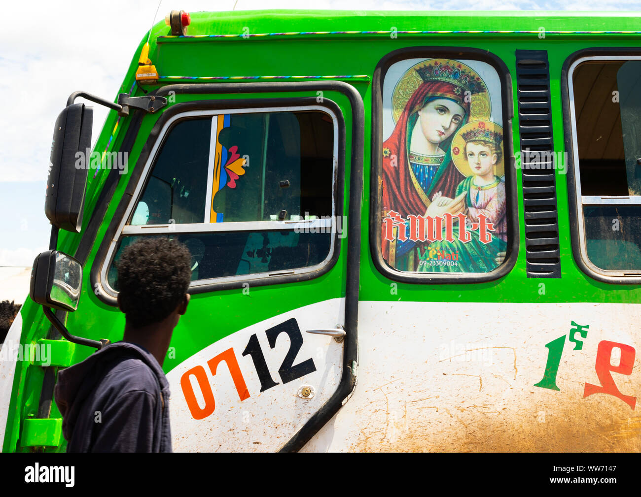 Bus decorated with virgin mary christian icon bringing muslim pilgrims ...