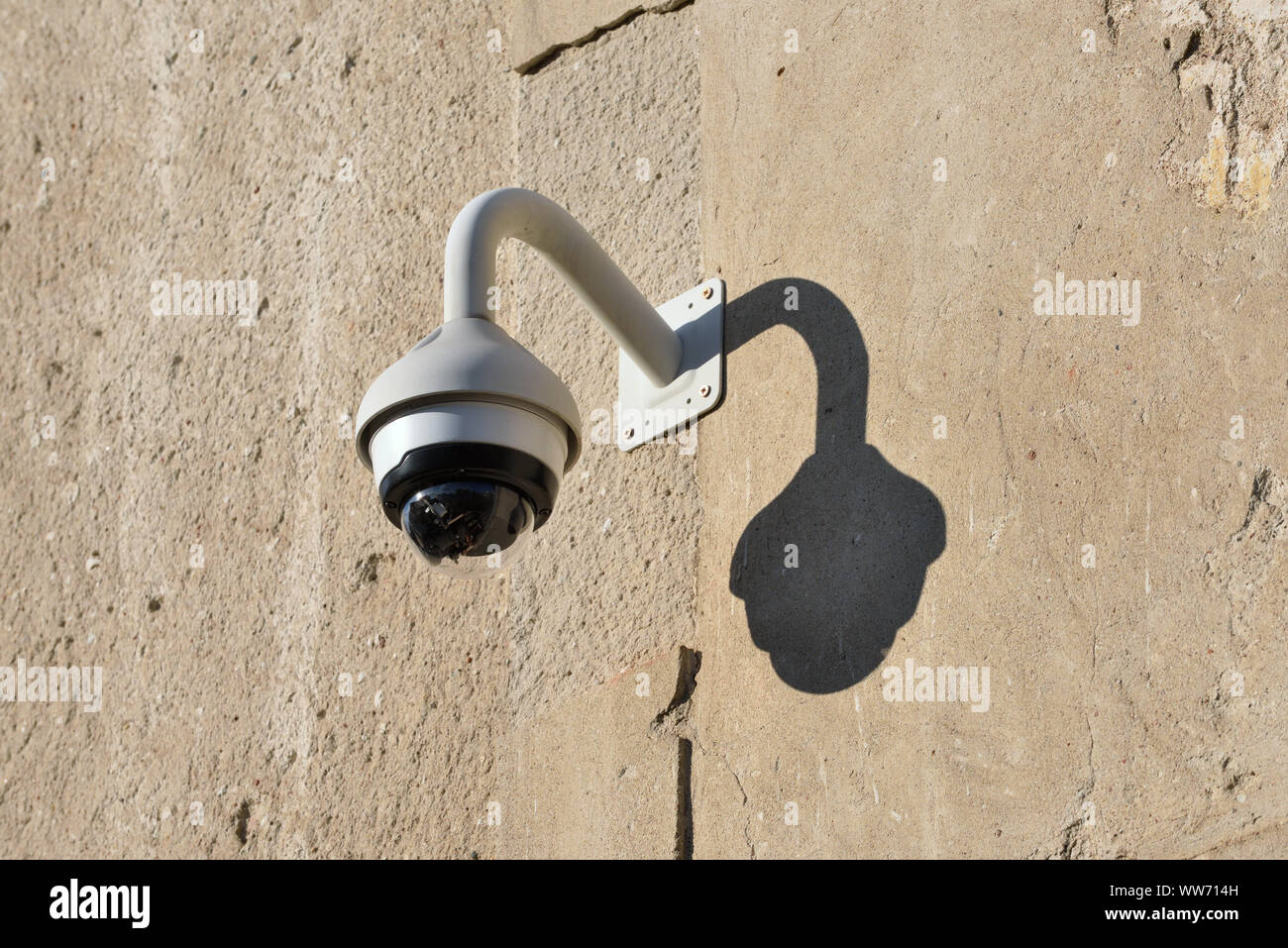 Modern CCTV security camera on stone building wall outdoors Stock Photo ...