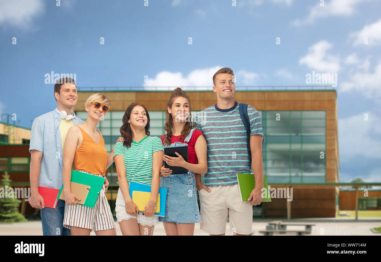 students with notebooks, books and folders Stock Photo - Alamy