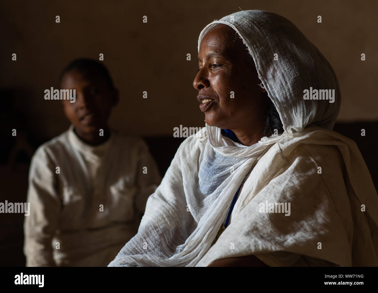 Eritrean orthodox woman and son in traditional clothing, Central region ...