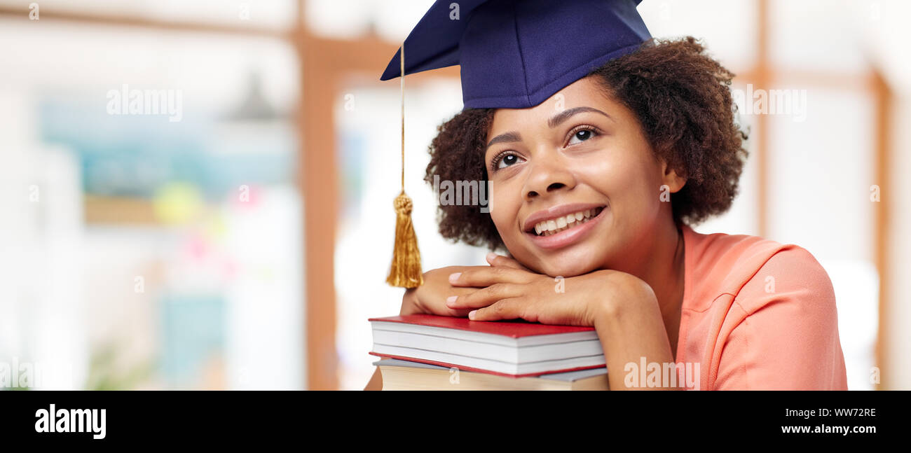 african american graduate student with books Stock Photo - Alamy