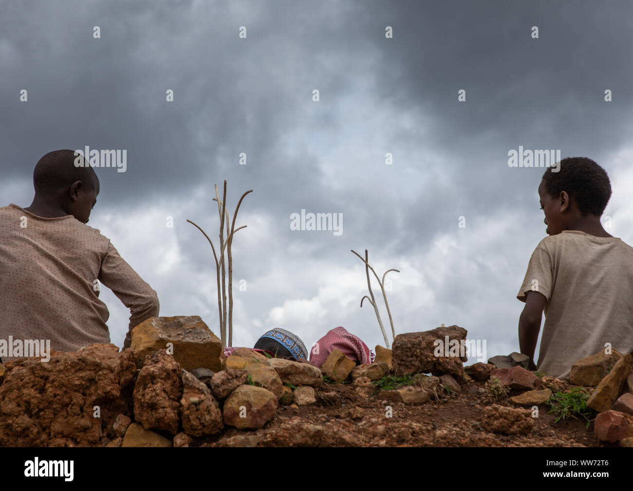 Oromo children selling forked stick oulle, Oromia, Sheik Hussein ...