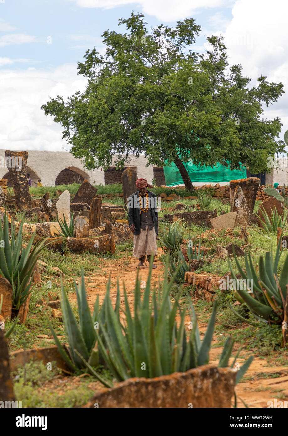 Oromo man in the cemetery of the shrine of sufi Sheikh Hussein , Oromia ...