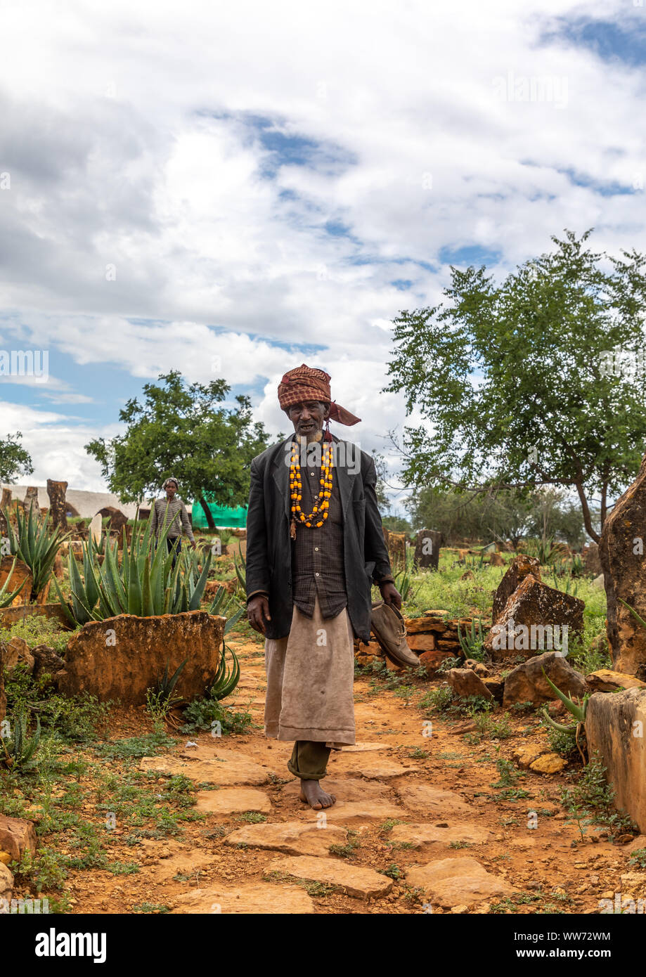 Oromo man in the cemetery of the shrine of sufi Sheikh Hussein , Oromia ...