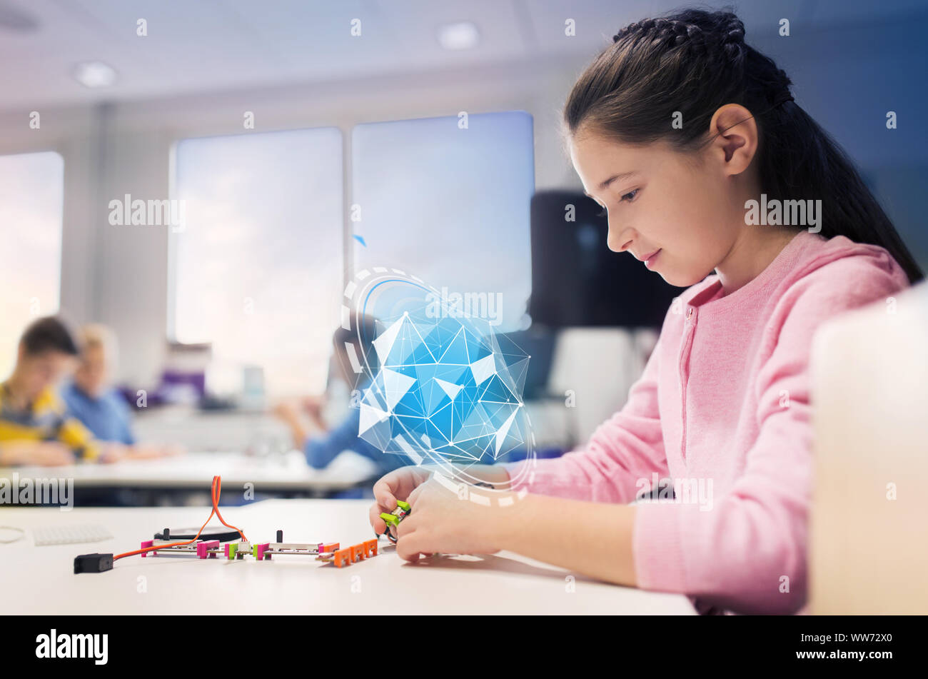 girl building robot at robotics school Stock Photo - Alamy