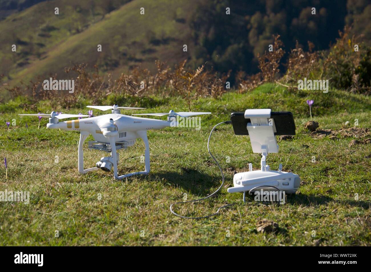 drone on the ground with remote in mountains Stock Photo - Alamy