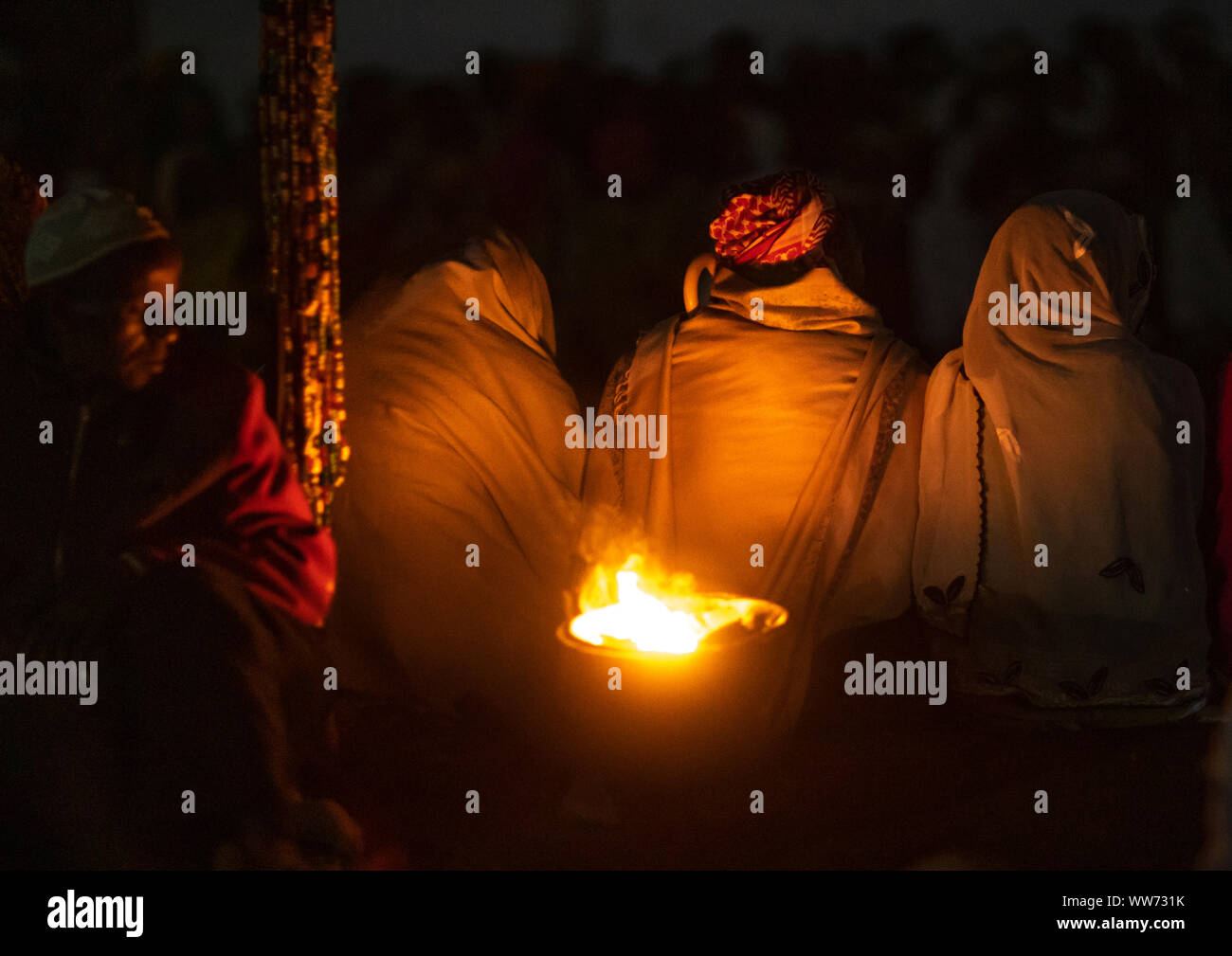 Oromo pilgrims praying in the night during the pilgrimage, Oromia ...