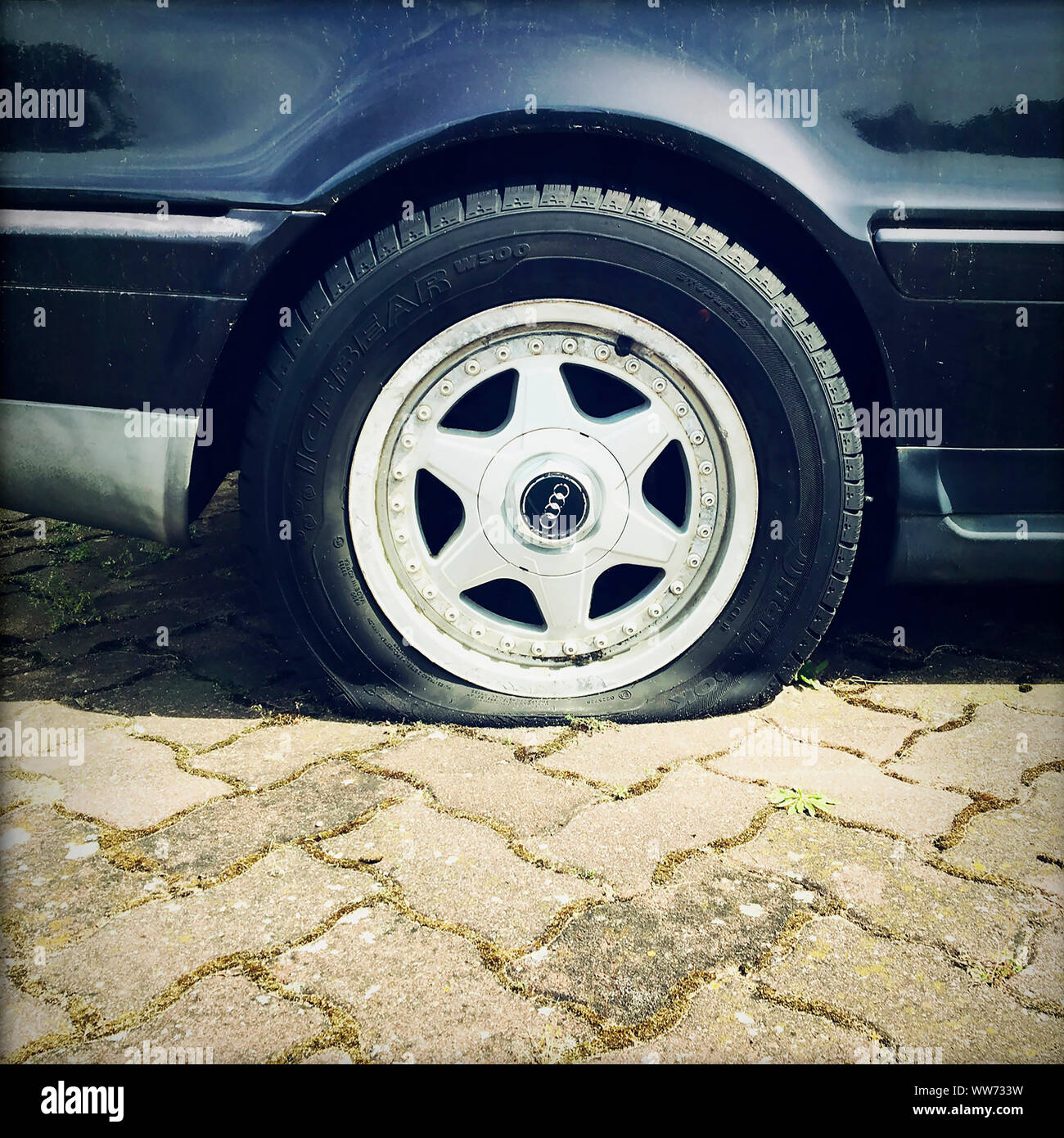 Flat tyre, car, detail, tire Stock Photo - Alamy