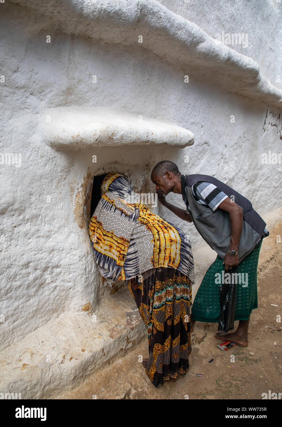 Oromo pilgrims looking inside the shrine which hosts the tomb of sufi ...