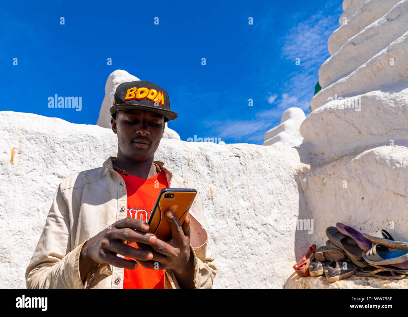 Oromo pilgrim with western clothes in the shrine of sufi Sheikh Hussein ...