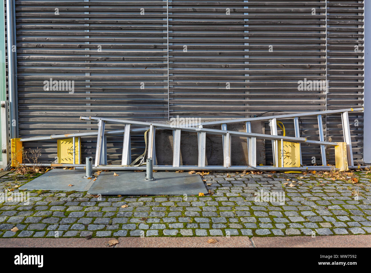 Two Big Aluminium Ladders Equipment Laying Down Stock Photo - Alamy