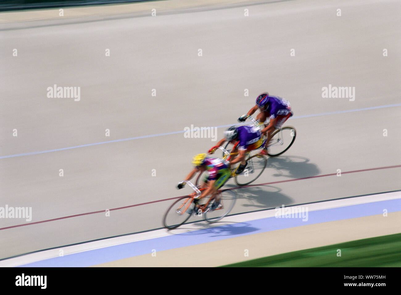 Blurred Motion of Cyclists Racing on a Velodrome track Stock Photo - Alamy