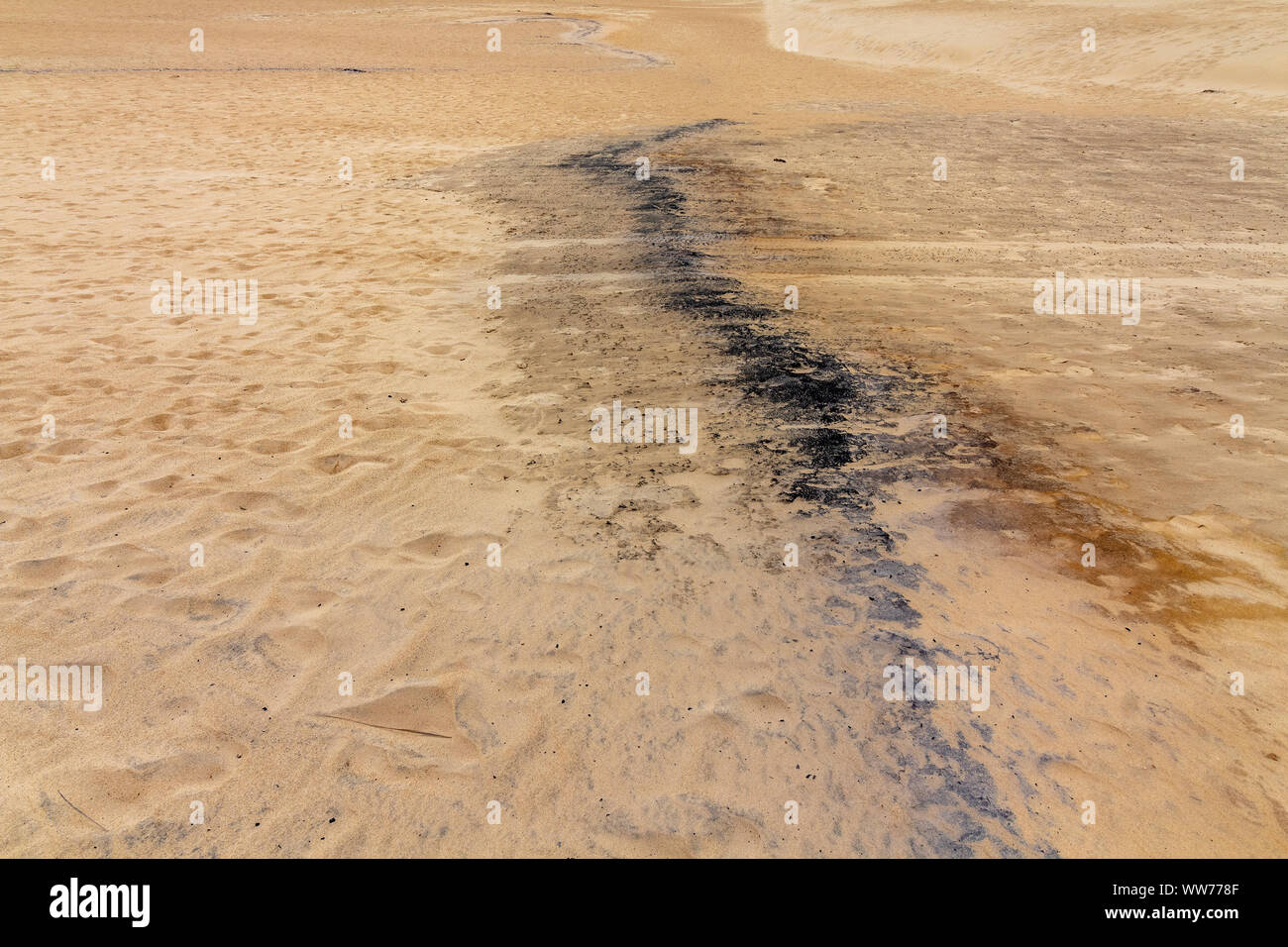 Black sand due to fire Stock Photo - Alamy