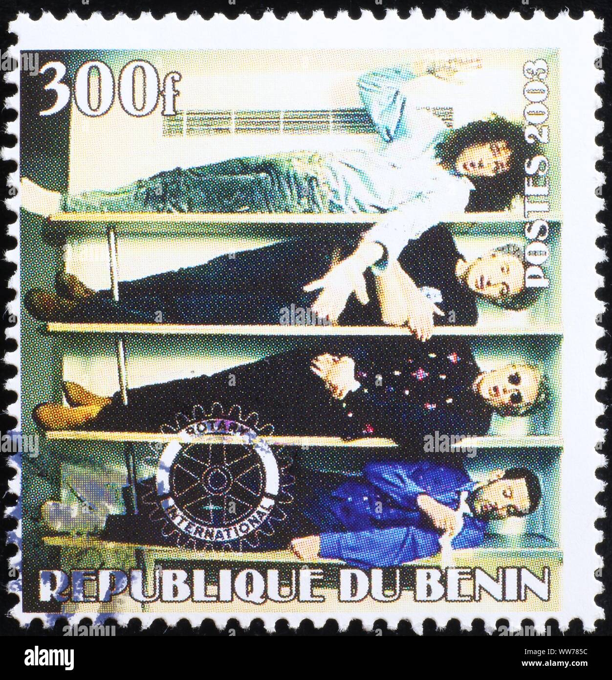 Funny picture of band the Queen on postage stamp Stock Photo - Alamy