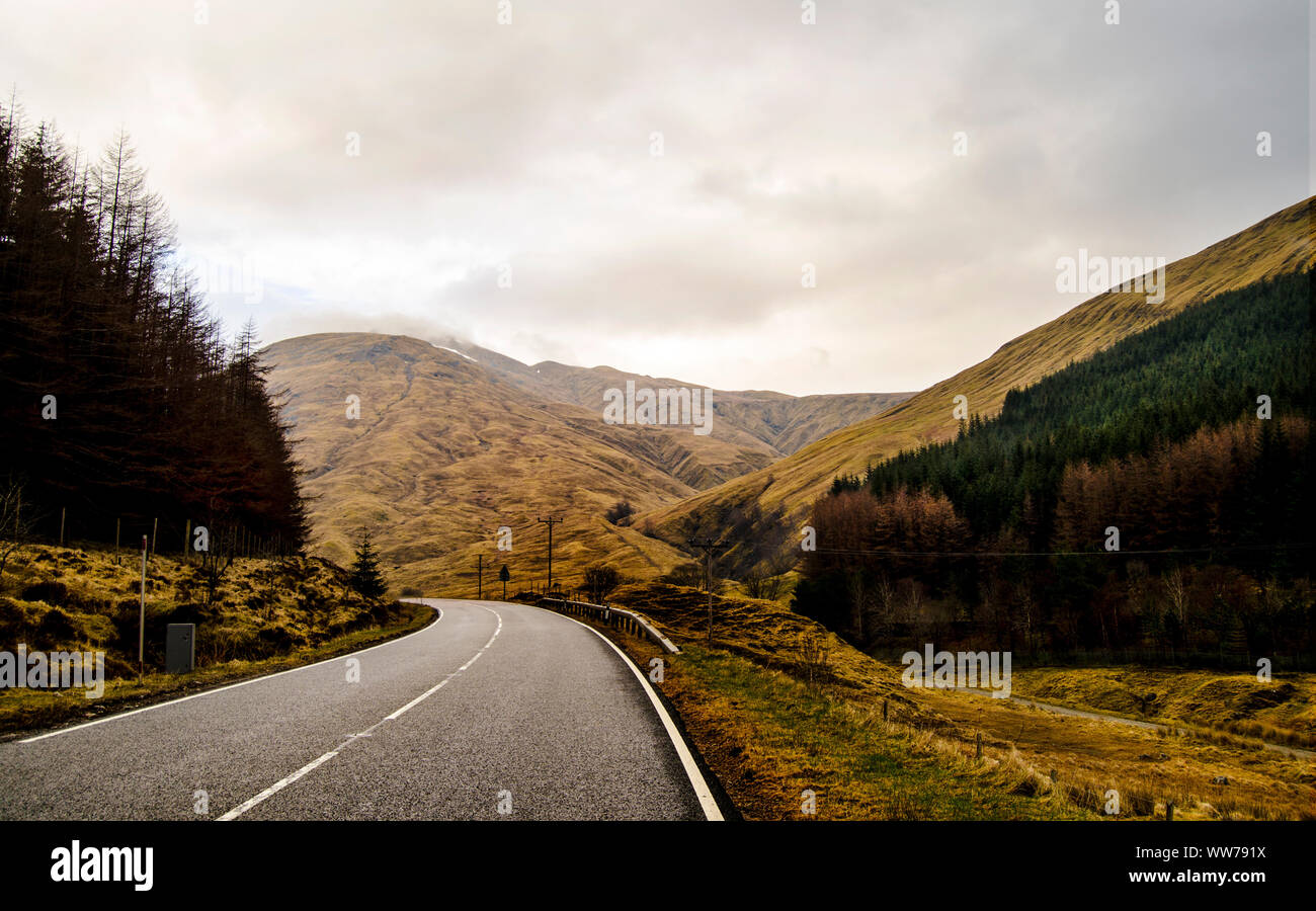 Country road in typical mountain landscape, Highlands, Scotland Stock ...