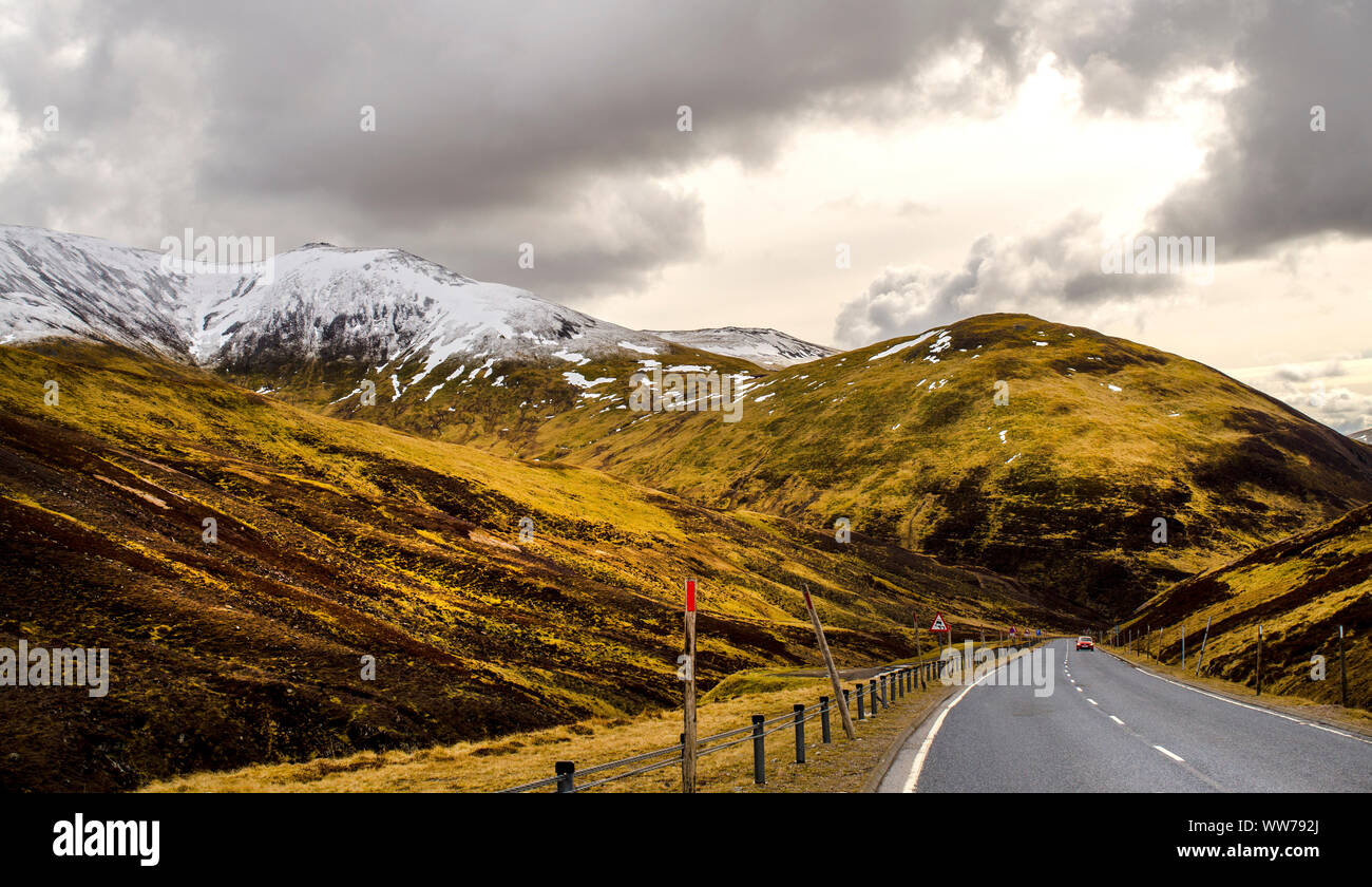 Country road in typical mountain landscape, Highlands, Scotland Stock ...