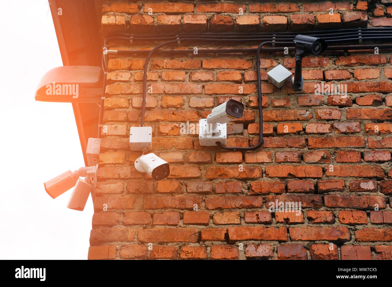 closed circuit camera Multi-angle CCTV system. a row of cameras hung on ...