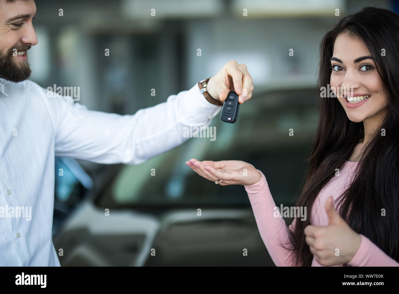 Handing car keys hi-res stock photography and images - Alamy