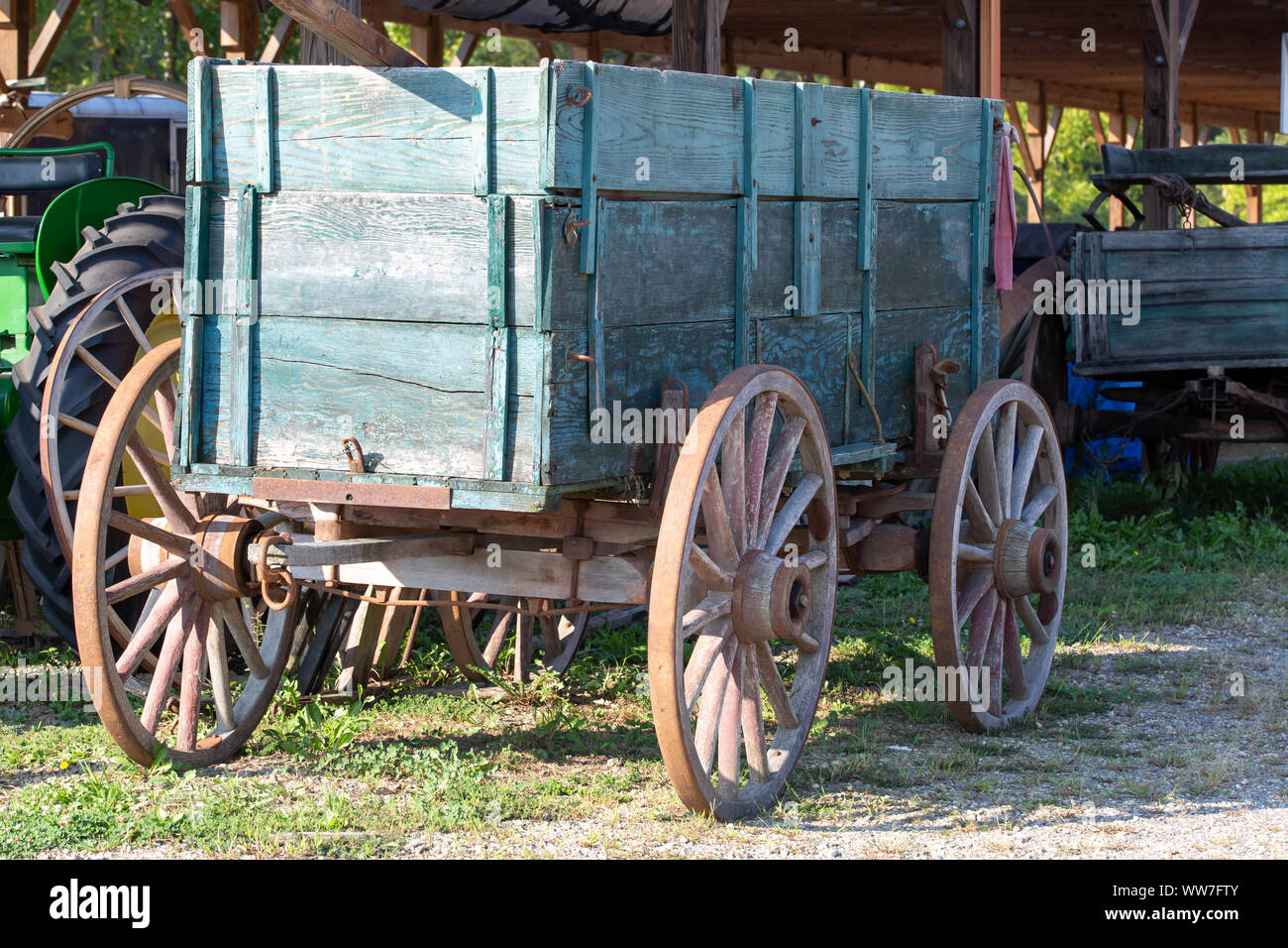 Old antique vintage wood wagon with retro wheels Stock Photo - Alamy