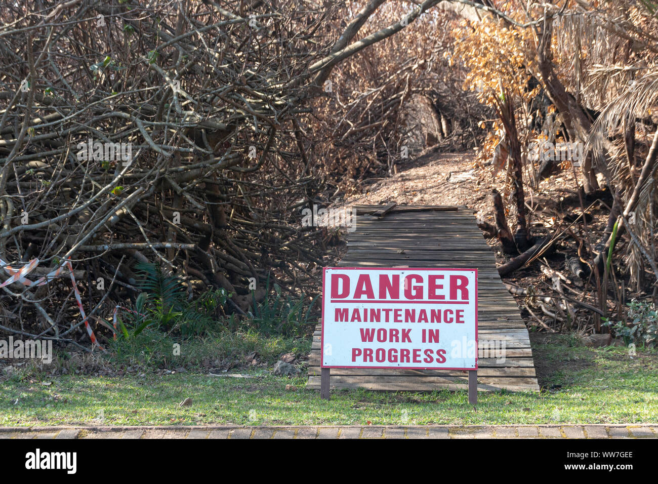 A close up view of a sign that says Danger, no entry zone due to ...