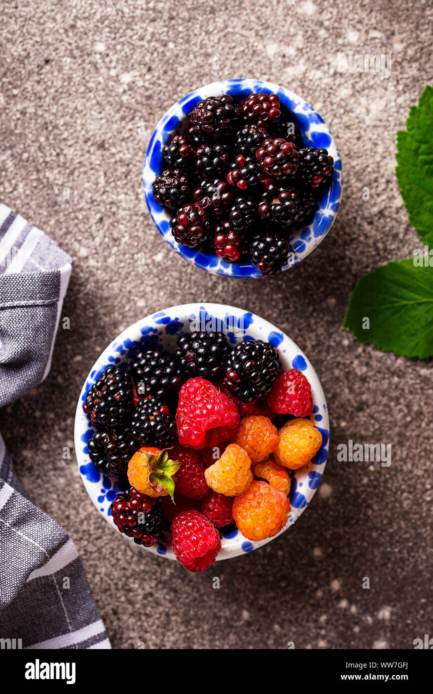 Red, black and yellow raspberry Stock Photo - Alamy