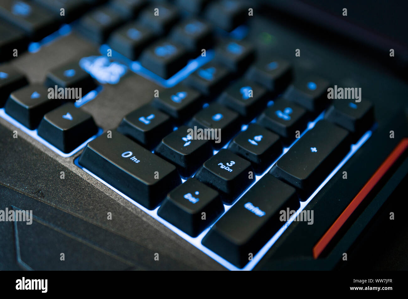 Gamer keyboard with colorful blue lights, modern gamer computer. Blue ...