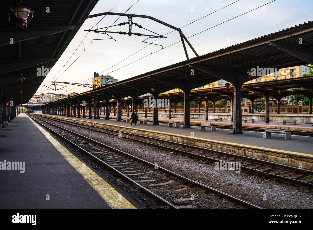 Travelers waiting for a train, on the platform of Bucharest North ...