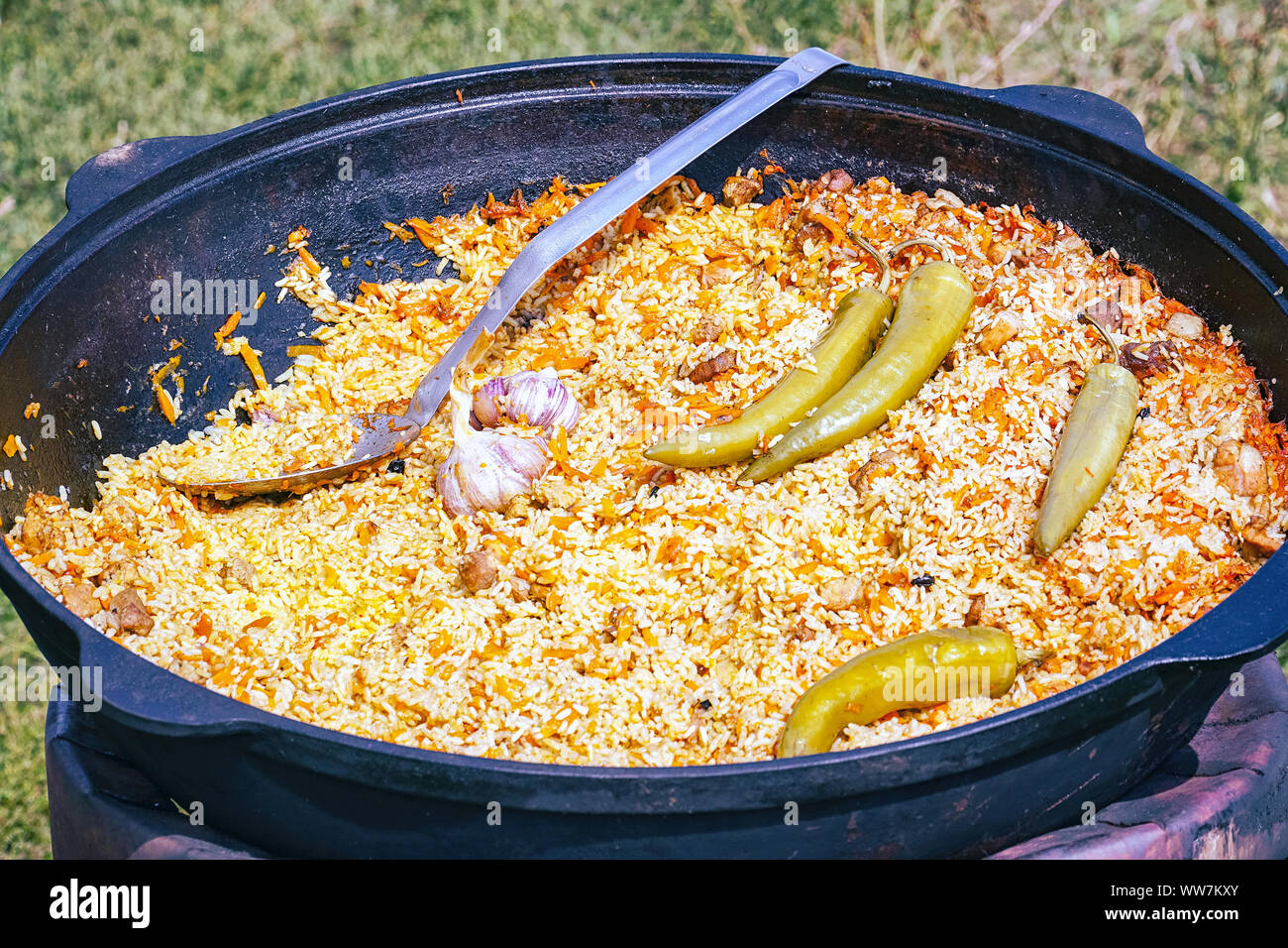 Traditional delicious pilaf with vegetables in a cauldron Stock Photo ...