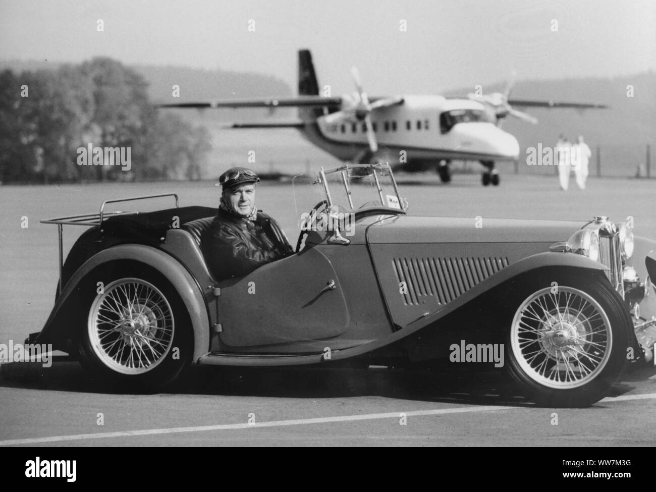 Vintage car, man Stock Photo - Alamy