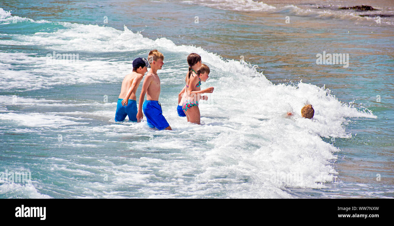 Children kid teenager wave hi-res stock photography and images - Alamy