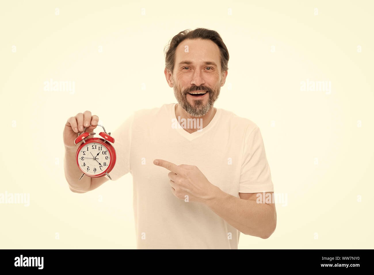 Just on time. Man bearded mature guy hold clock isolated on white. Man ...