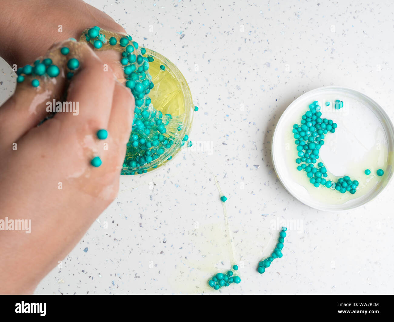 The child playing slime in happy time Stock Photo - Alamy