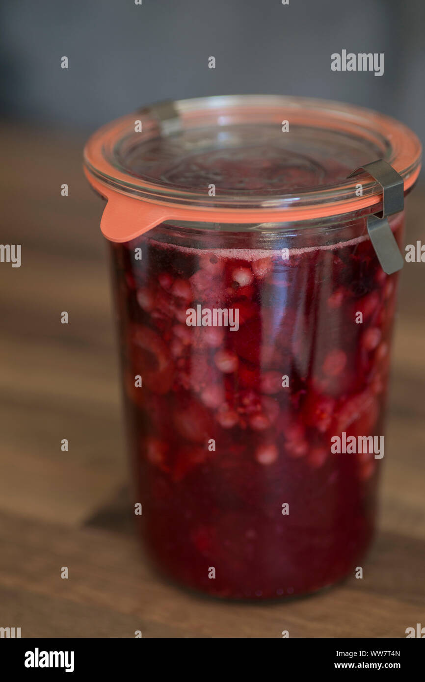 bottled red berry pudding Stock Photo - Alamy