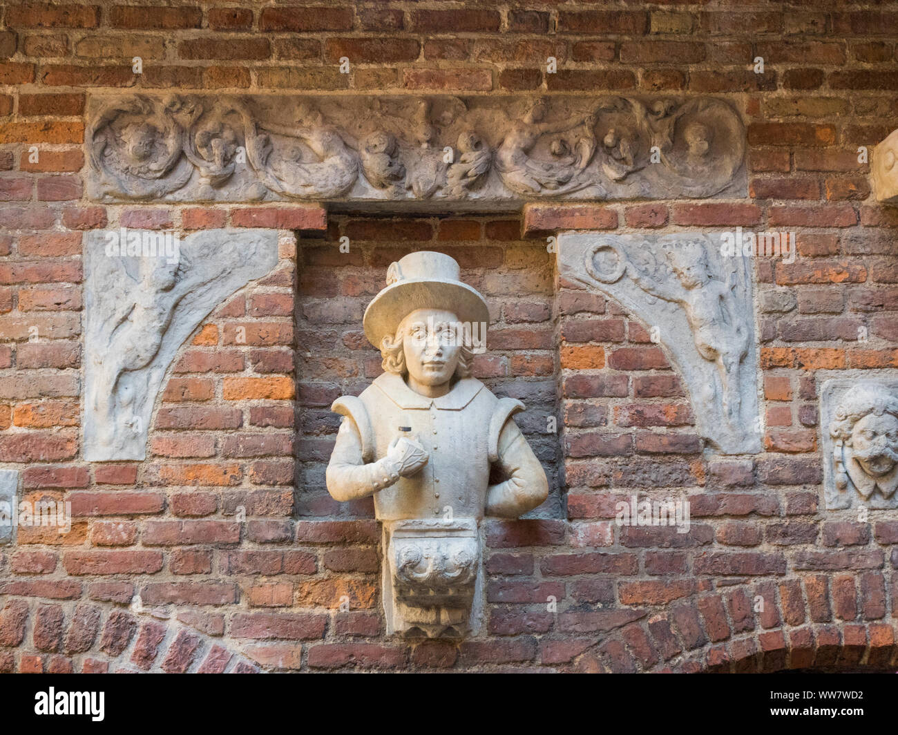 Bust on Brick Wall Stock Photo - Alamy