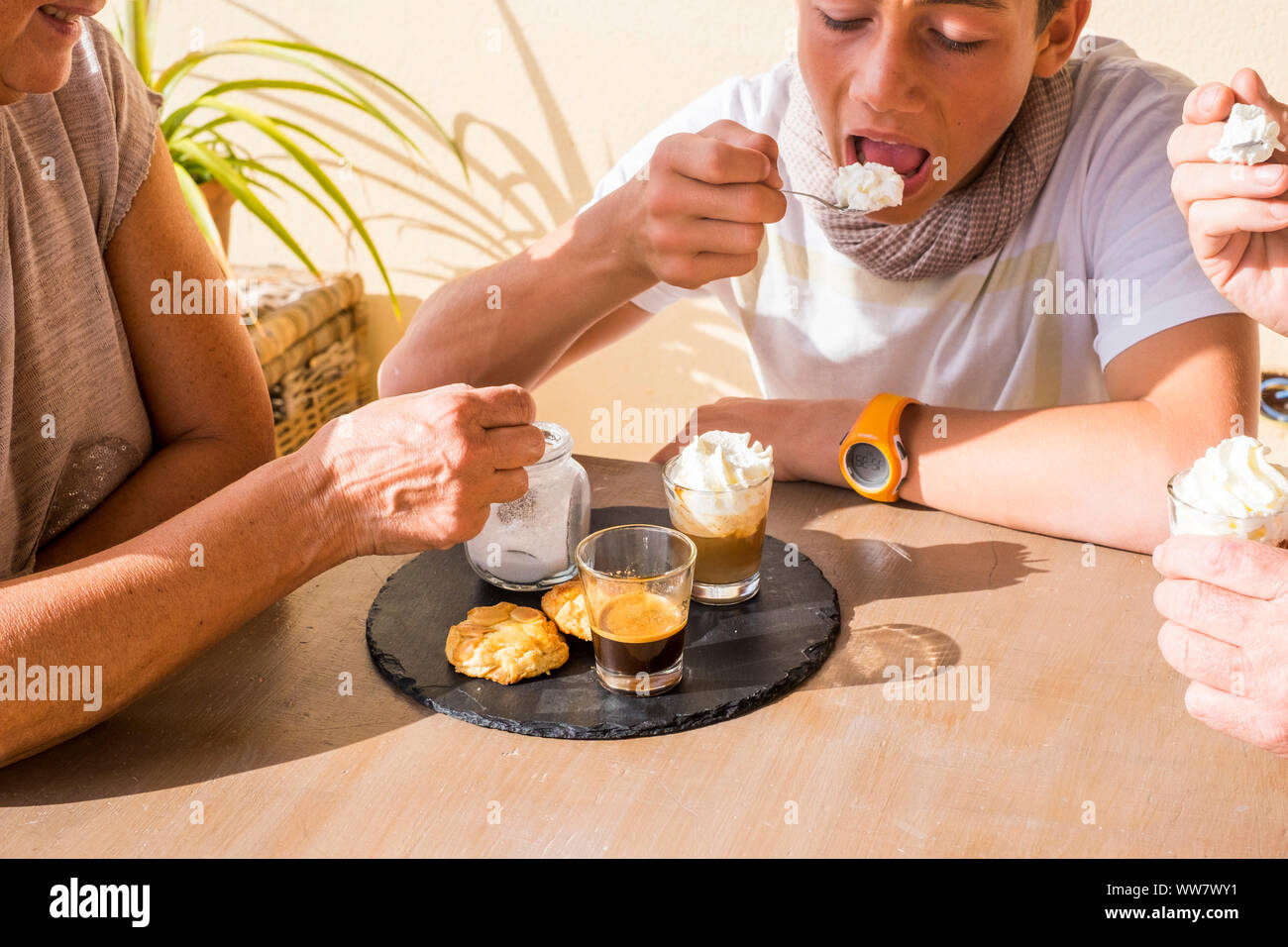 Elderly lady eating biscuits hi-res stock photography and images - Alamy