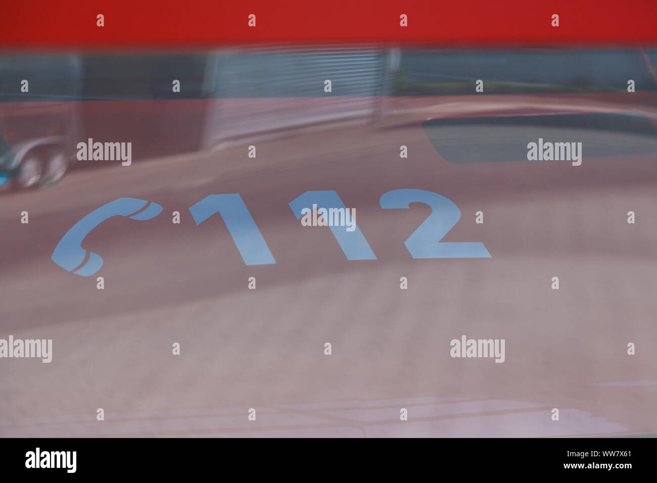 Emergency call 112 - a rescue car standing prepared in the garage Stock ...