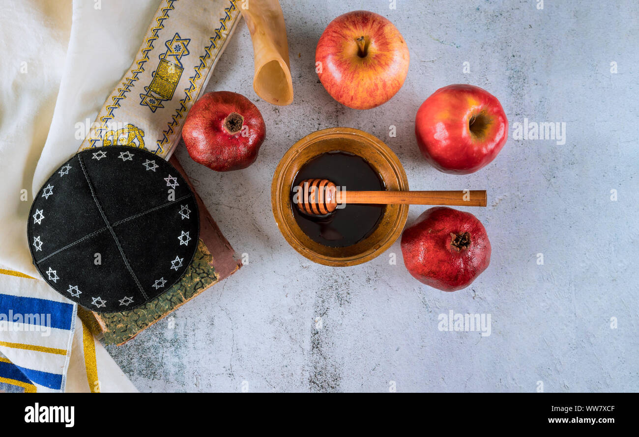 A jewish new year with honey for the apple and pomegranate holiday of ...