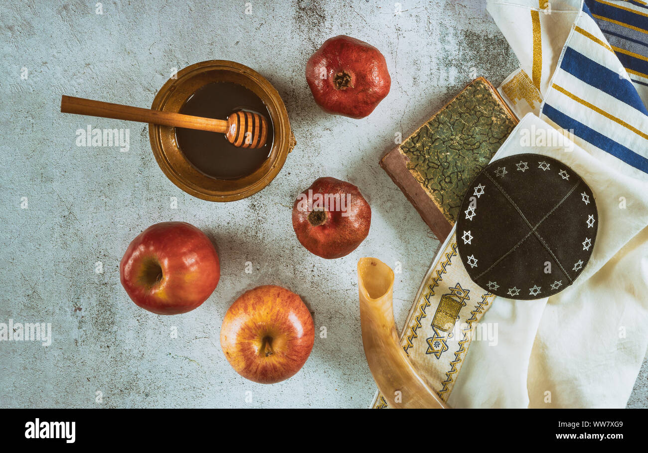 Table in the synagogue are symbols of Rosh Hashanah apple and ...