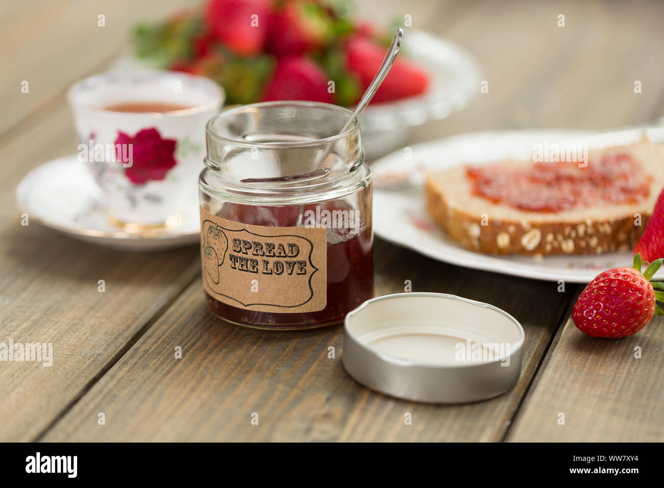 Strawberry jam, bread, preserving jar Stock Photo - Alamy