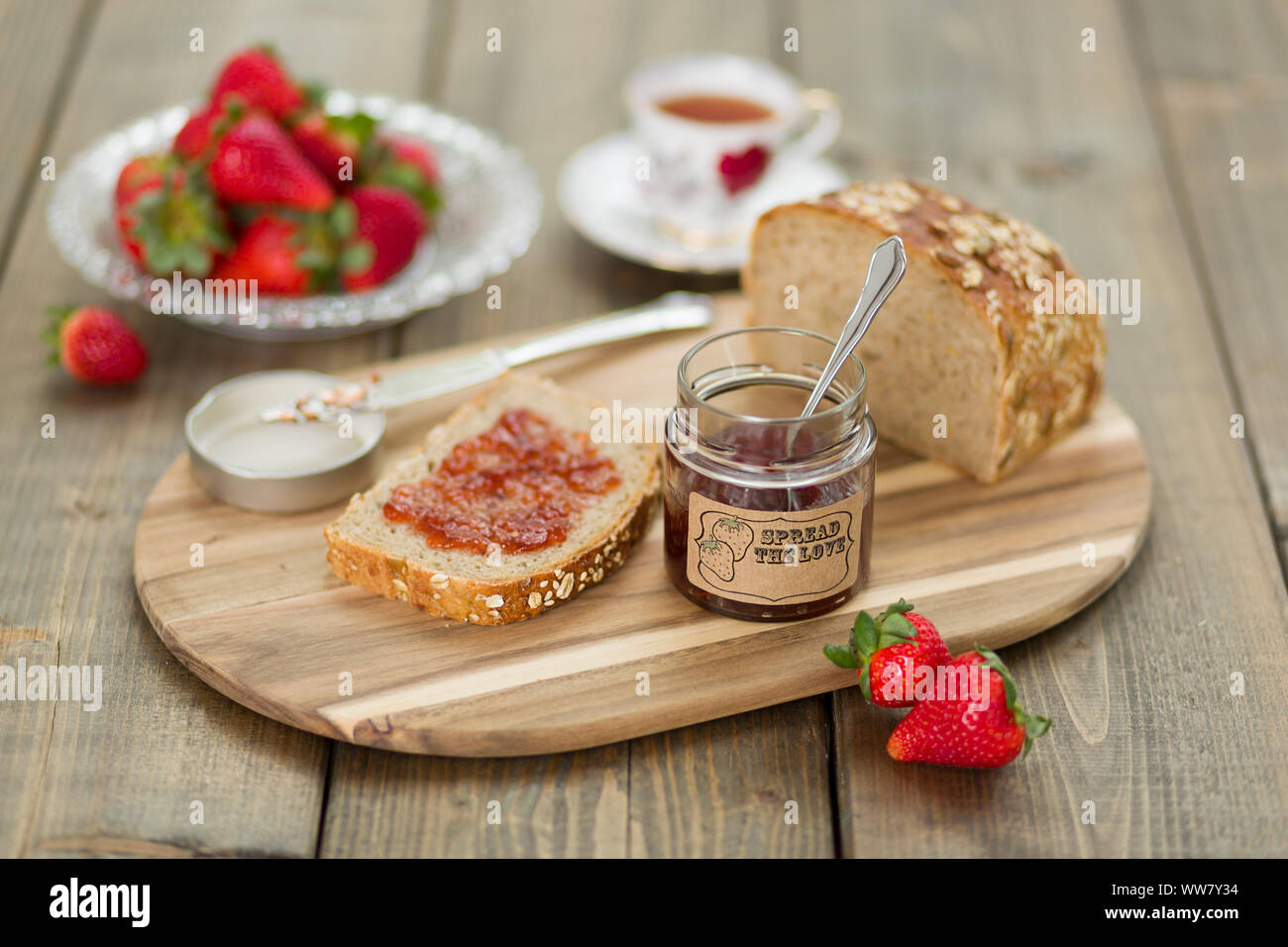 Strawberry jam, preserving jar, serving tray Stock Photo - Alamy