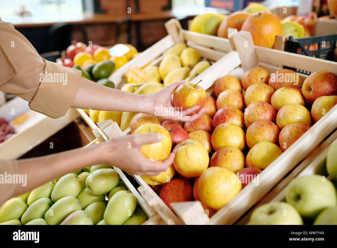 Woman choosing apples from box hi-res stock photography and images - Alamy