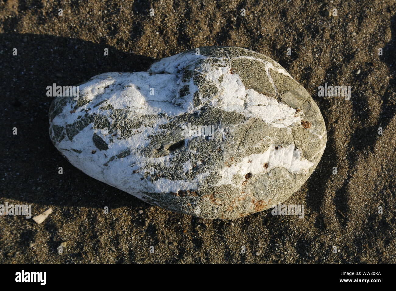 Sand background with stones for summer. Sandy beach texture. Macro shot ...