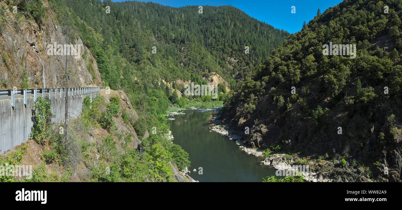 A highway follows, then crosses, the canyon of the Rogue River, a ...