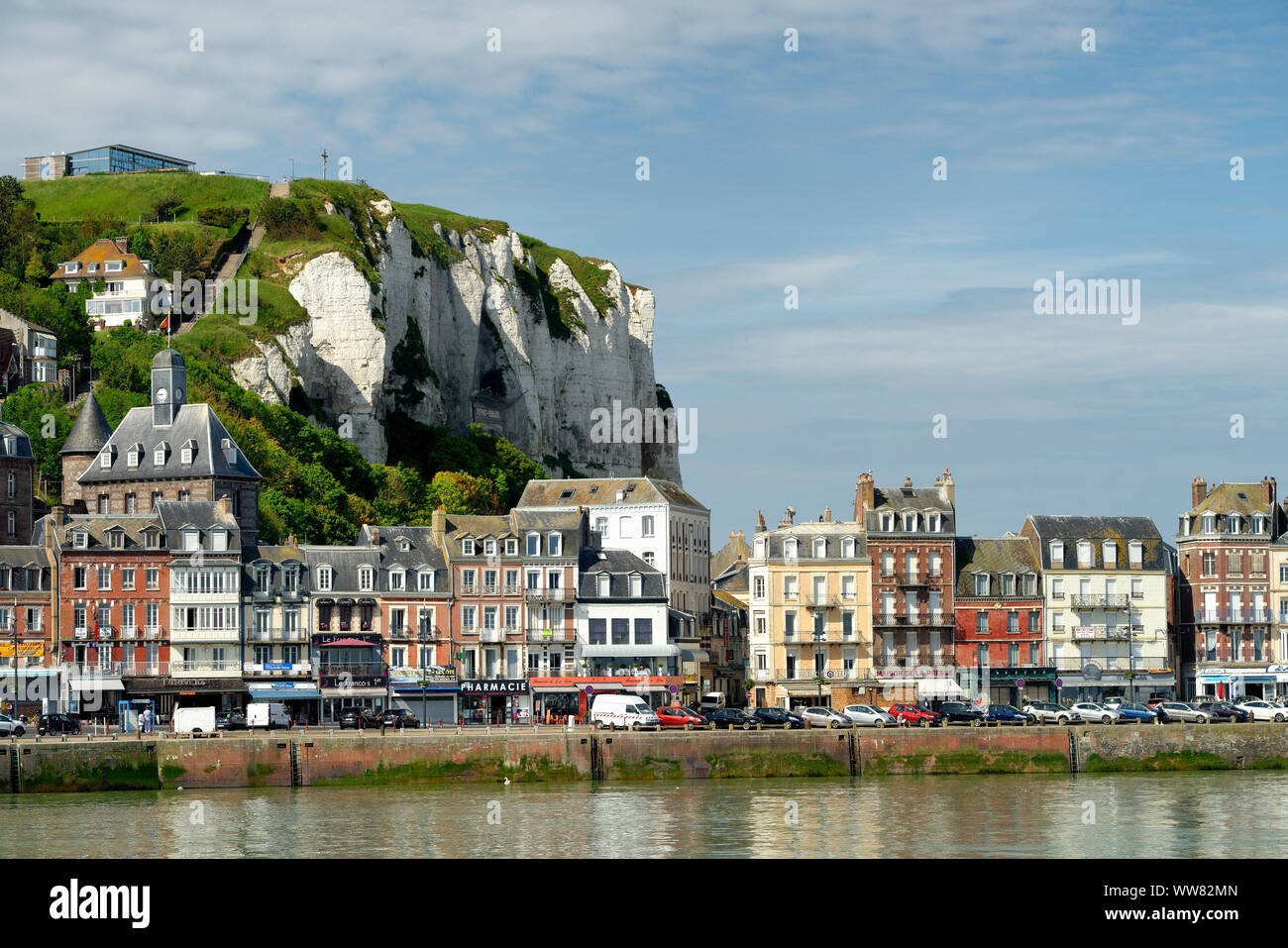 View from the harbour on the old town and chalk rock of Le Treport ...